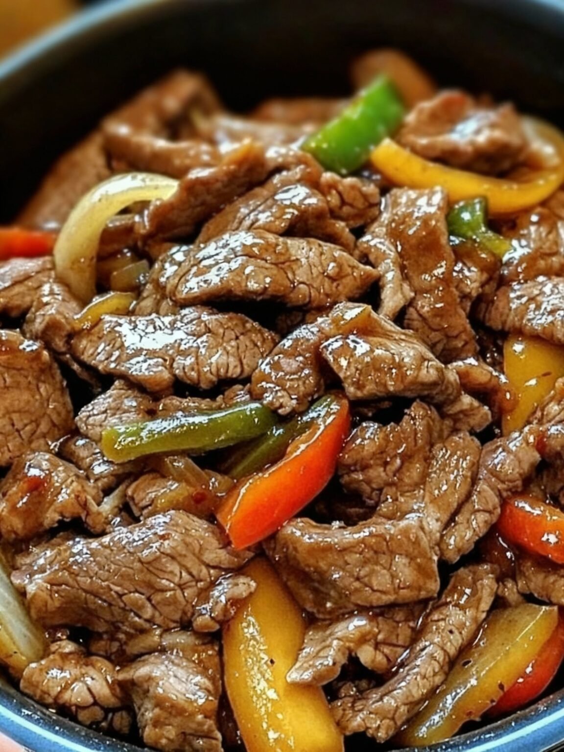 Sizzling Chinese Pepper Steak With Onions Recipe - rapidrecipes.blog
